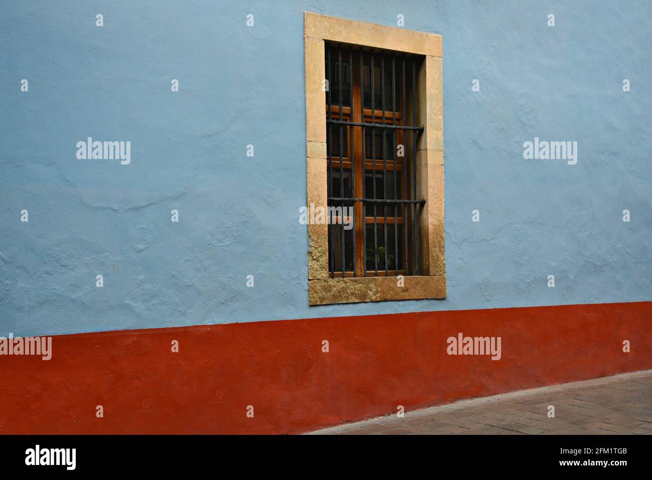 Spanish Colonial building facade with a light blue Venetian stucco wall ...
