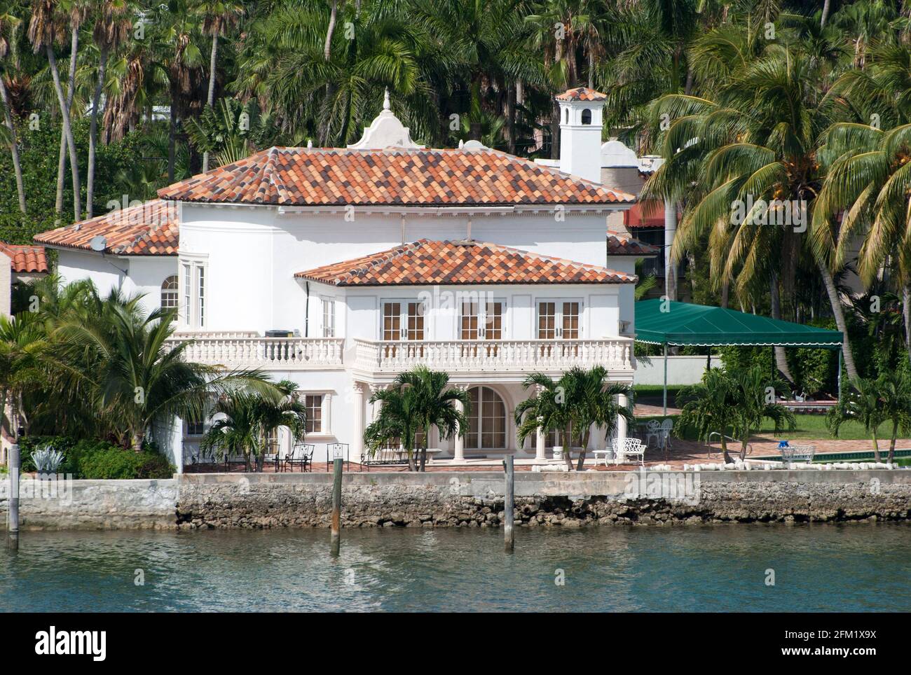 The large luxury house surrounded by tropical greenery on residential ...