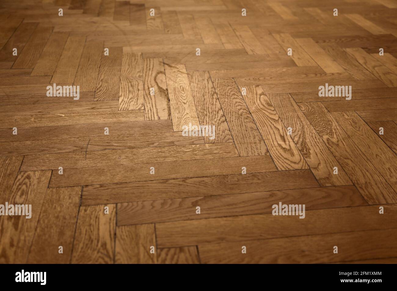 Detail of a parquet floor in a house Stock Photo - Alamy