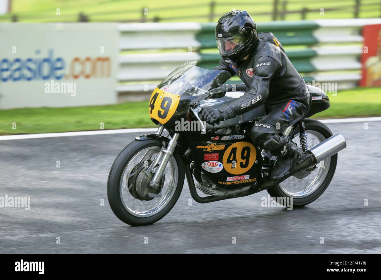 Nigel Palmer on the 480cc Ducati approaches Hall Bends during the ...