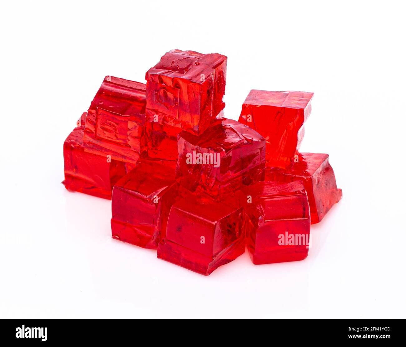 Block of red strawberry jelly on a white background Stock Photo - Alamy