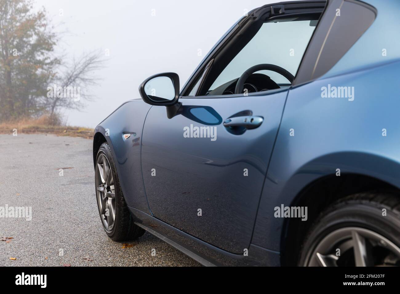 Driver's side view of a new, blue 2020 Mazda MX-5 Miata GT RF Stock ...