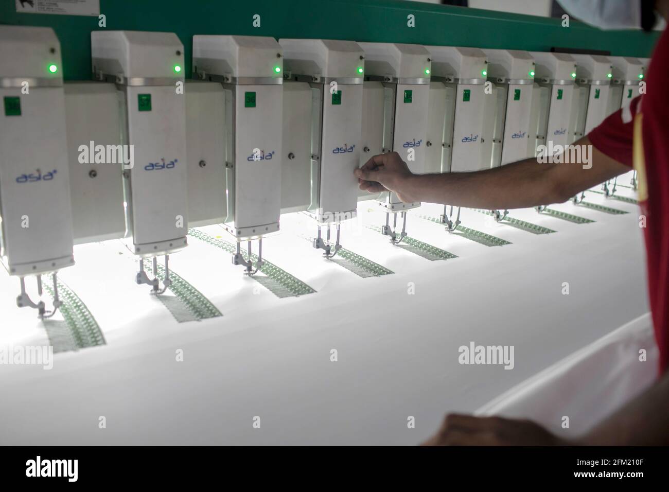 An Islamic Tupi (cap) seen being made at a factory in Bangladesh ahead ...