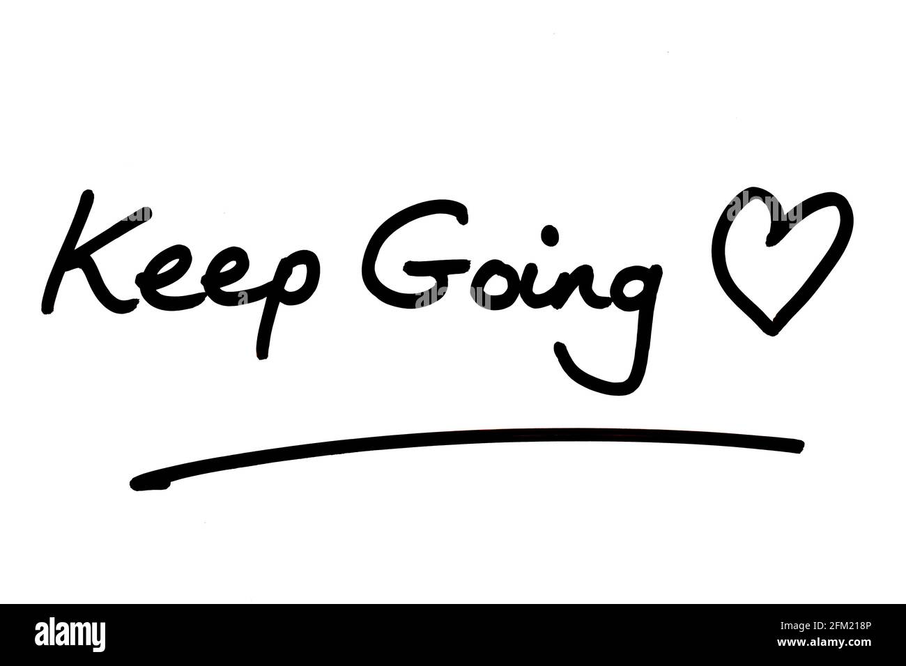 Keep Going, handwritten on a white background Stock Photo - Alamy