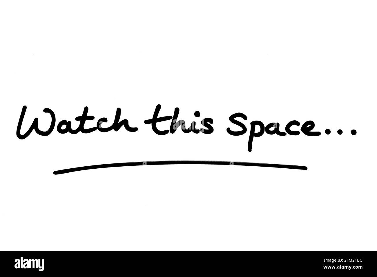 Watch this space… handwritten on a white background Stock Photo - Alamy
