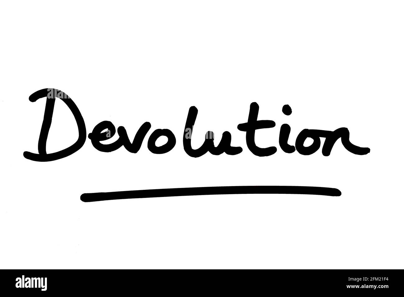Devolution, handwritten on a white background Stock Photo - Alamy