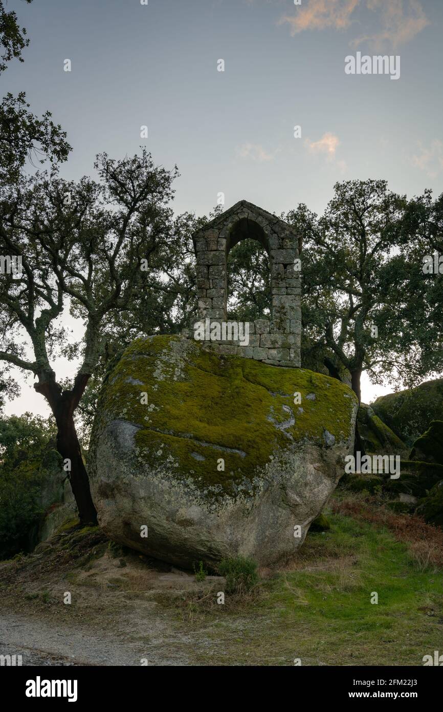 Ancient ruin stone structure building covered with moss near Sao Pedro ...