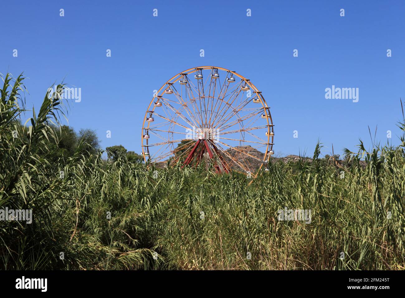The ferris wheel in Faliraki town, Rhodes, Greece Stock Photo - Alamy