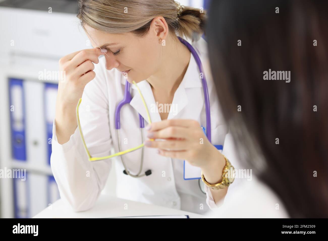 Closeup doctor receiving help hi-res stock photography and images - Alamy