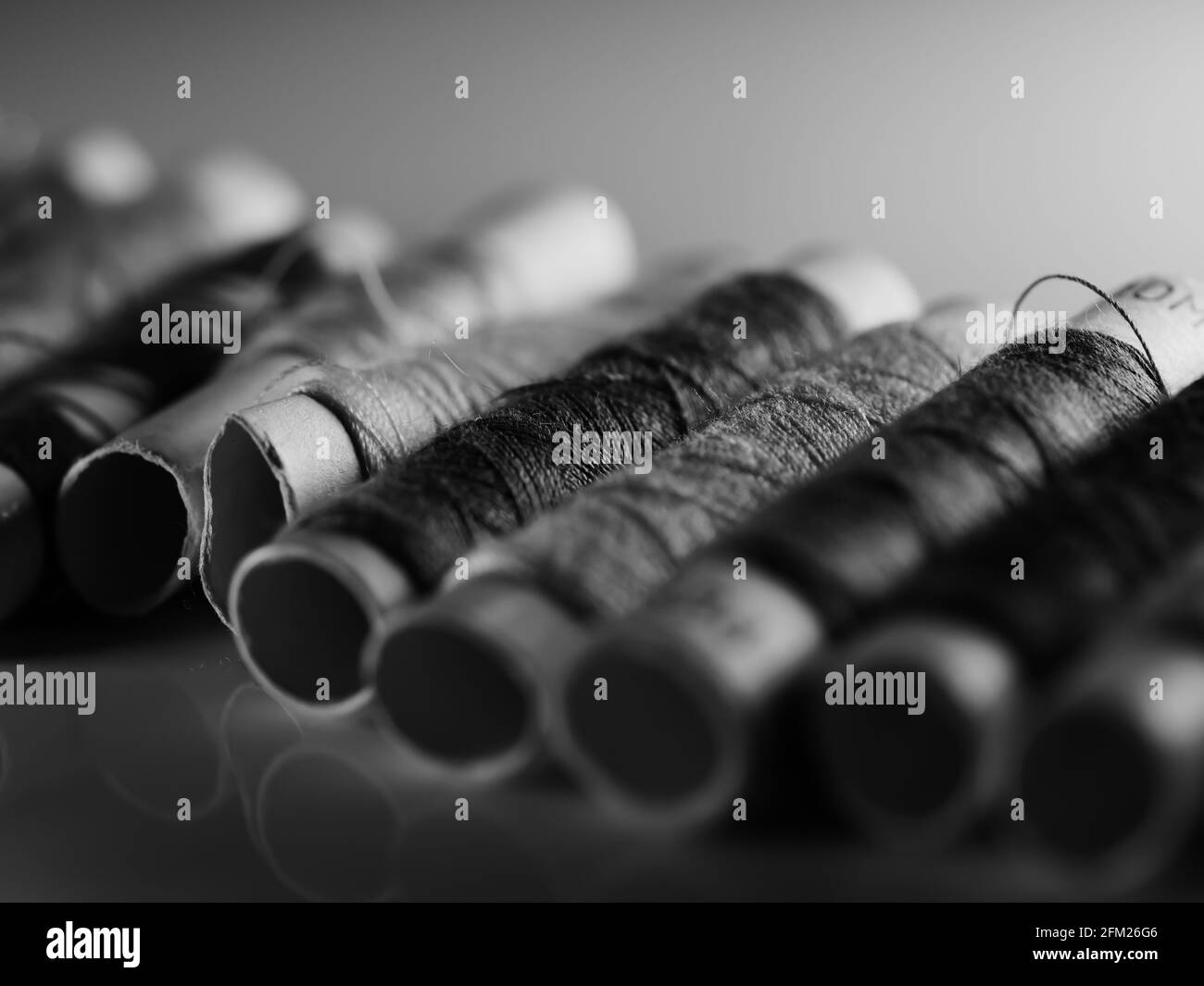 Fiber sewing threads Black and White Stock Photos & Images - Alamy