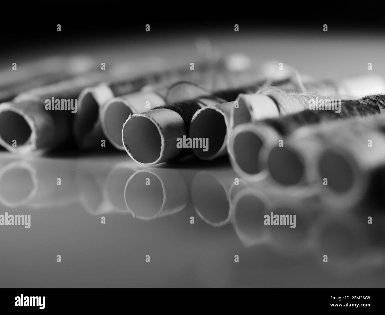 Sewing threads multicolored background closeup, selective focus, macro ...