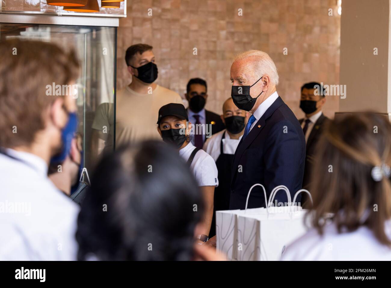 US President Joe Biden picks up tacos during a visit to Las Gemelas ...