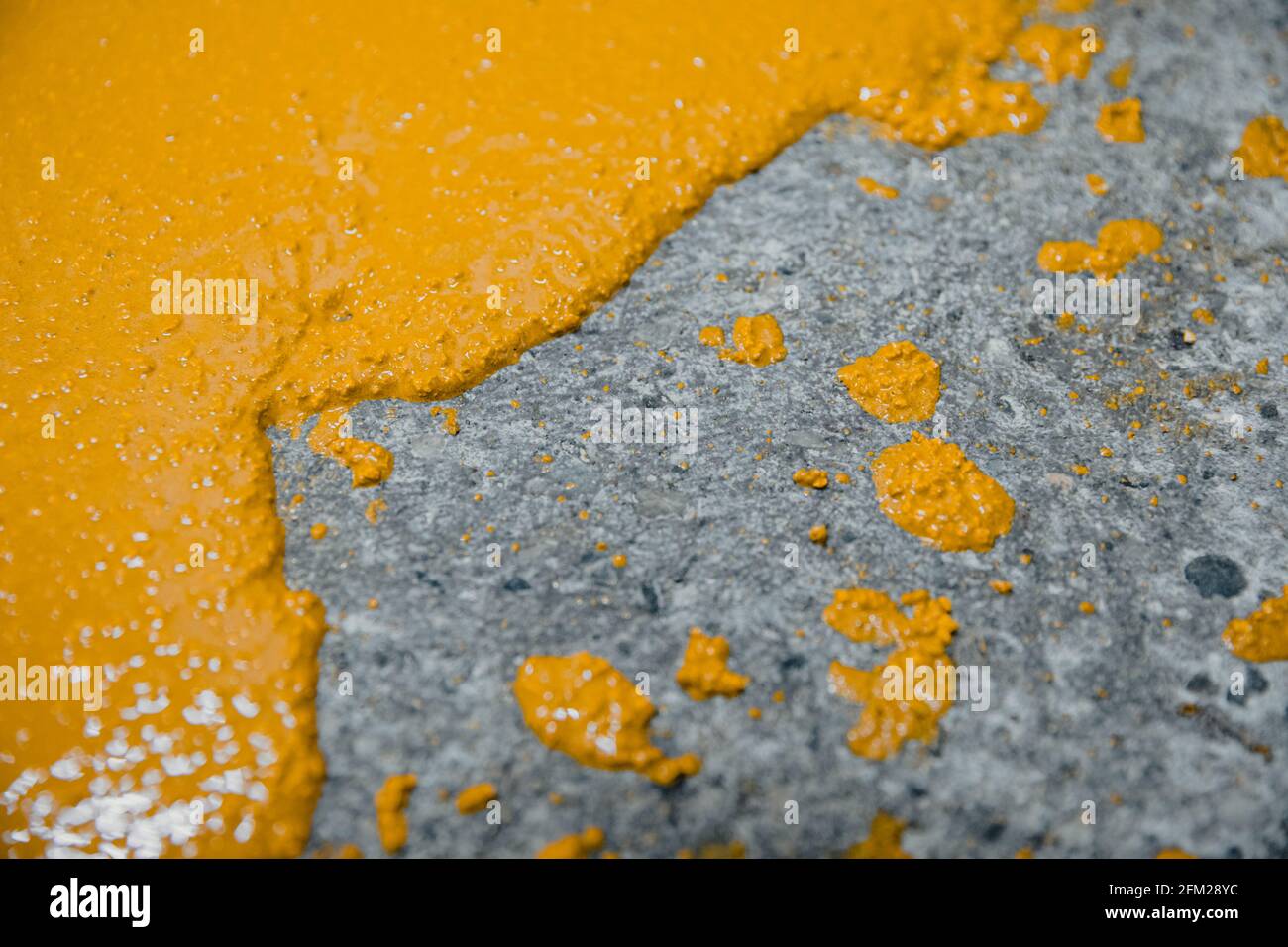 Selective focus on the yellow floor of freshly applied epoxy mortar ...