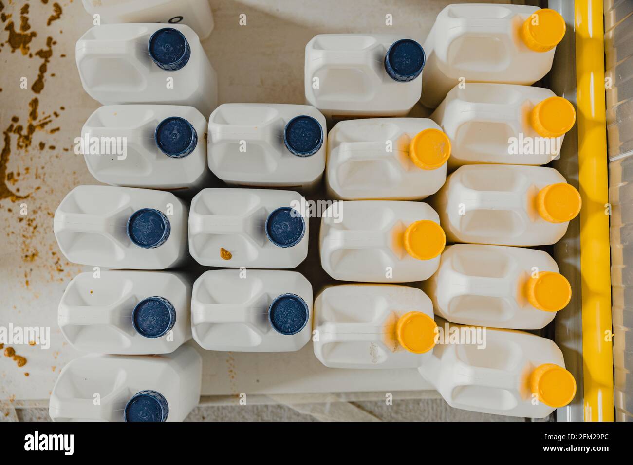 Plastic container cans for liquid chemical solutions Stock Photo - Alamy
