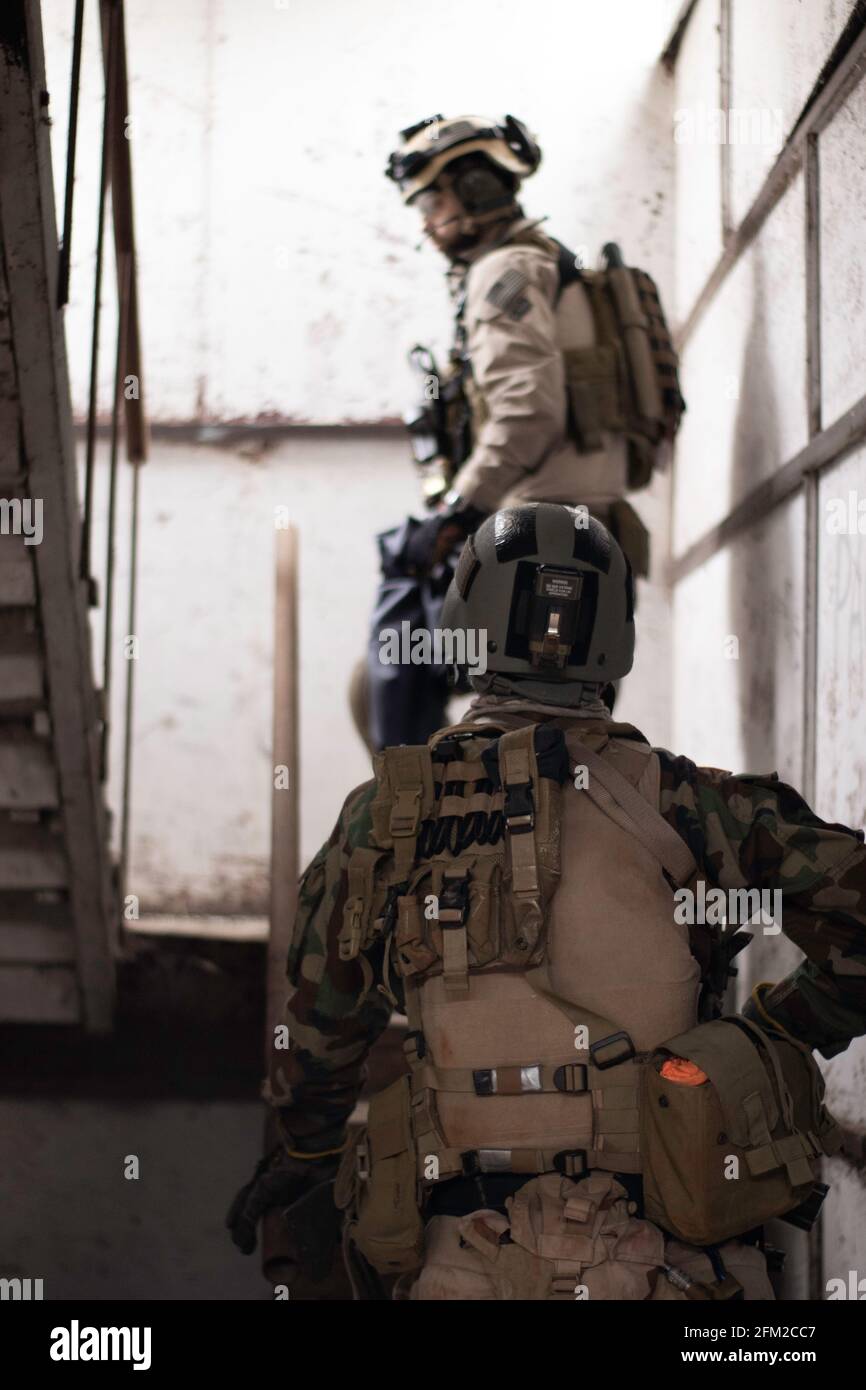 two guys in american military uniform stand on the stairs, airsoft ...