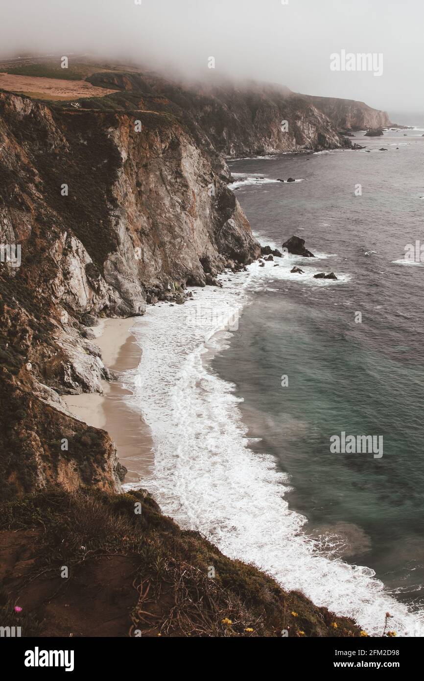 Panoramic shot of the beautiful Big Sur Coast of California on a misty ...