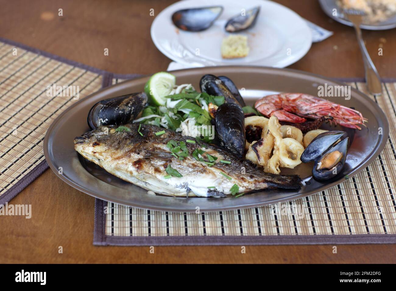 Mix fish plate in a seafood restaurant Stock Photo - Alamy