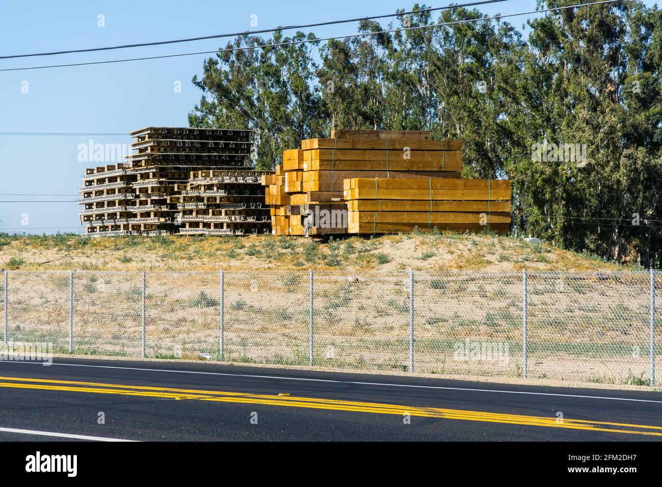 Huge timbers and other bridge building supplies for the rerouting of ...