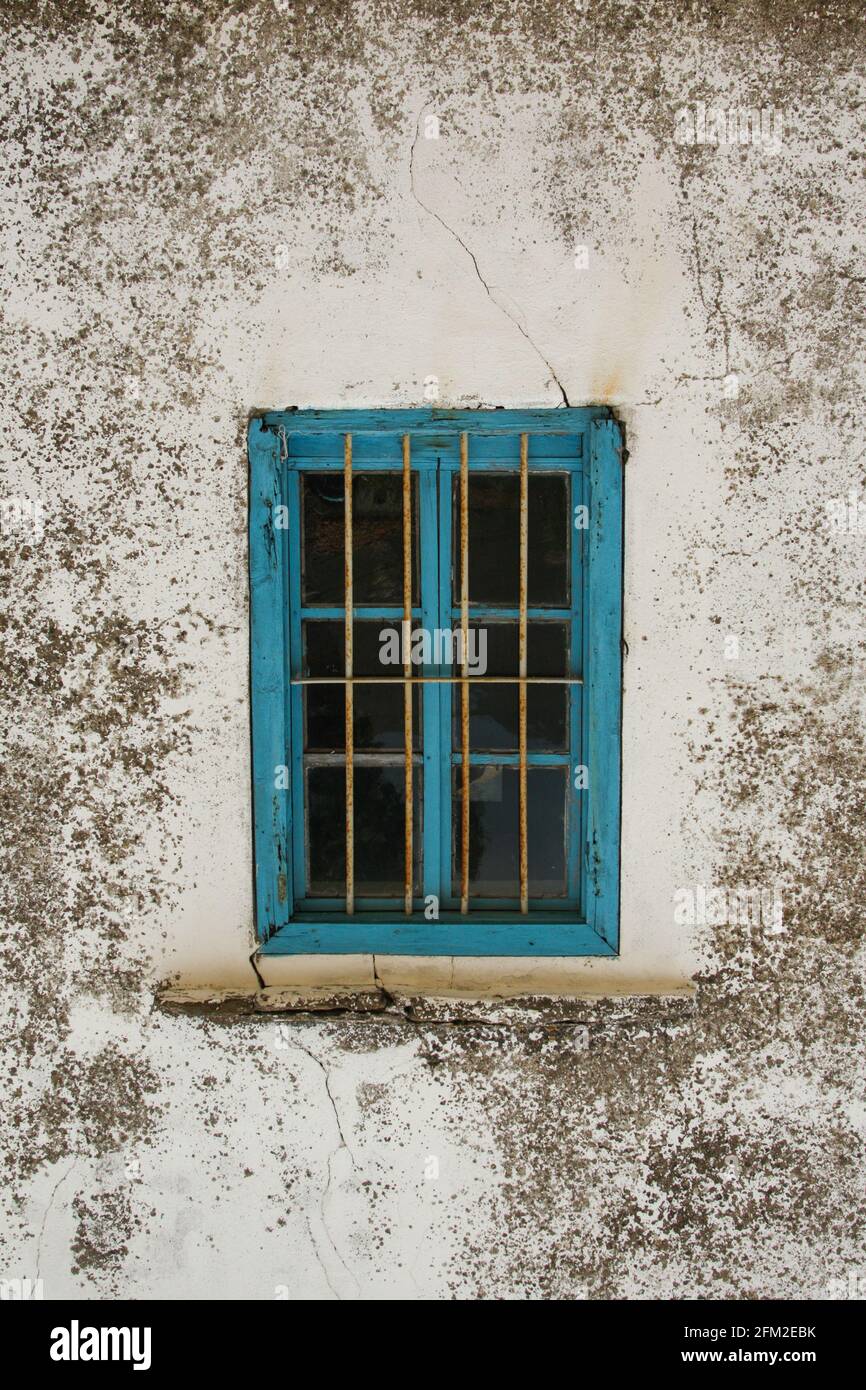 A blue wooden traditional turkish window - closed - shut - white wall ...