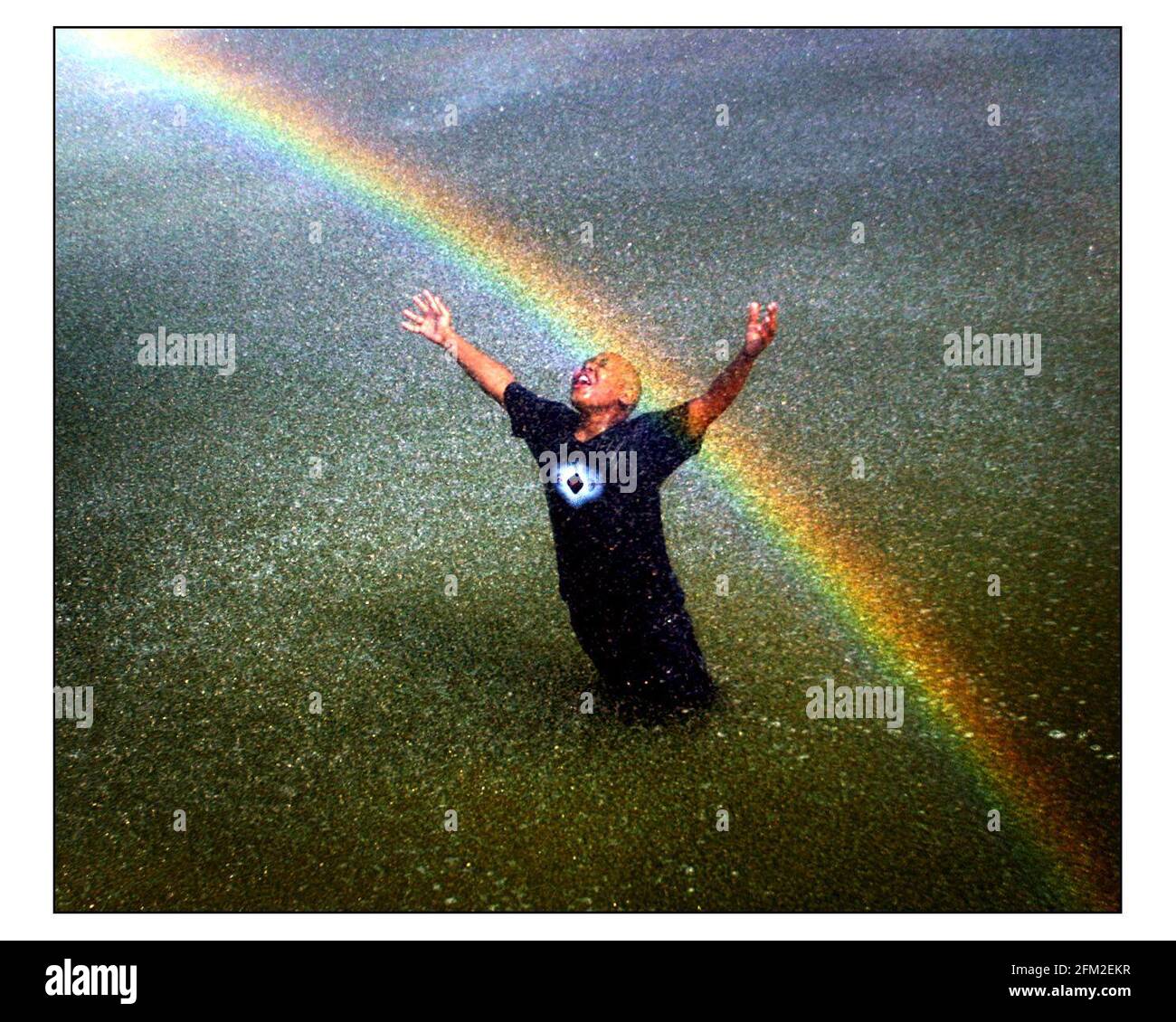 In the HEAT of the day.....Troy McDowell enjoyes a dip in the fountains ...