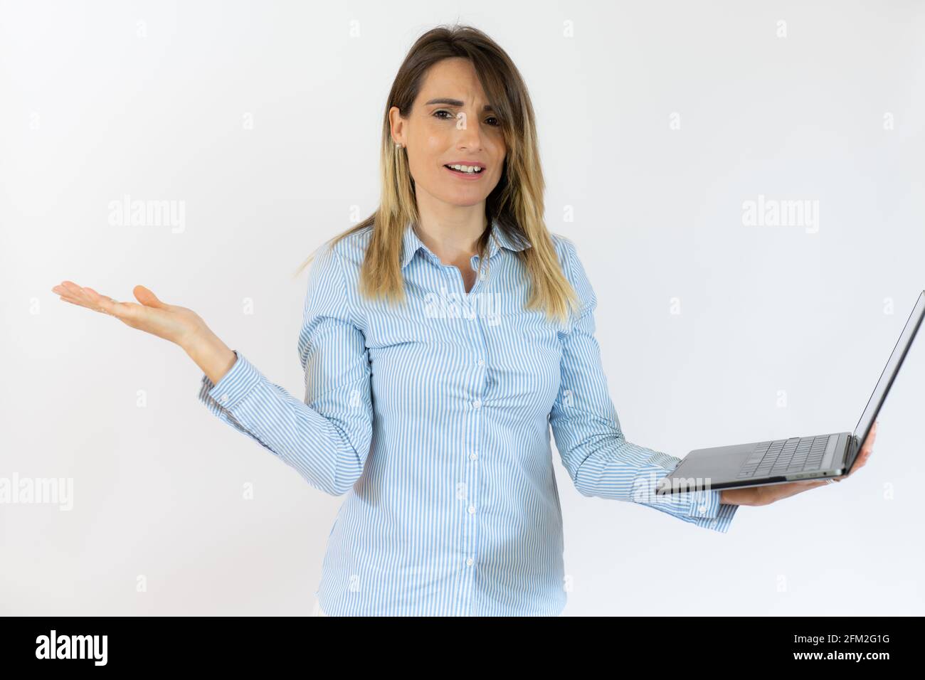 Image of excited woman standing isolated over white background using ...