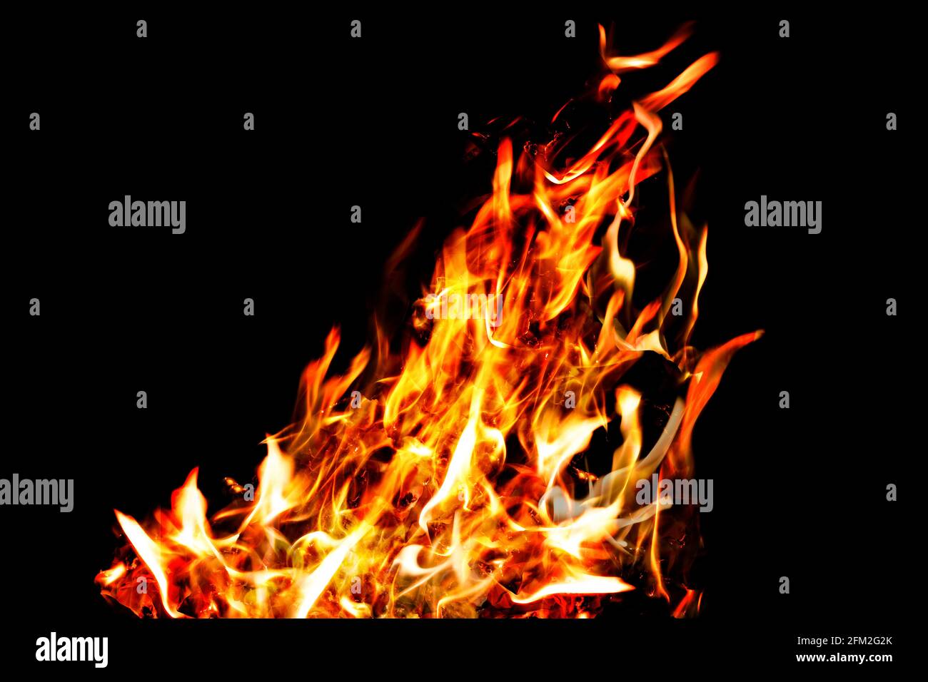 Red and yellow vibrant fire flame on black background Stock Photo - Alamy