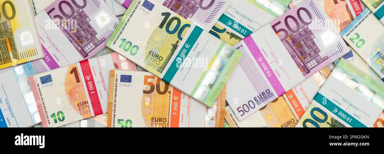 bundles of many Euro banknotes Stock Photo - Alamy