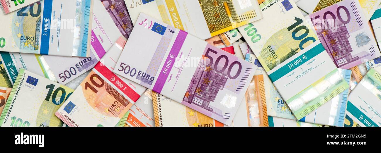 bundles of many Euro banknotes Stock Photo - Alamy