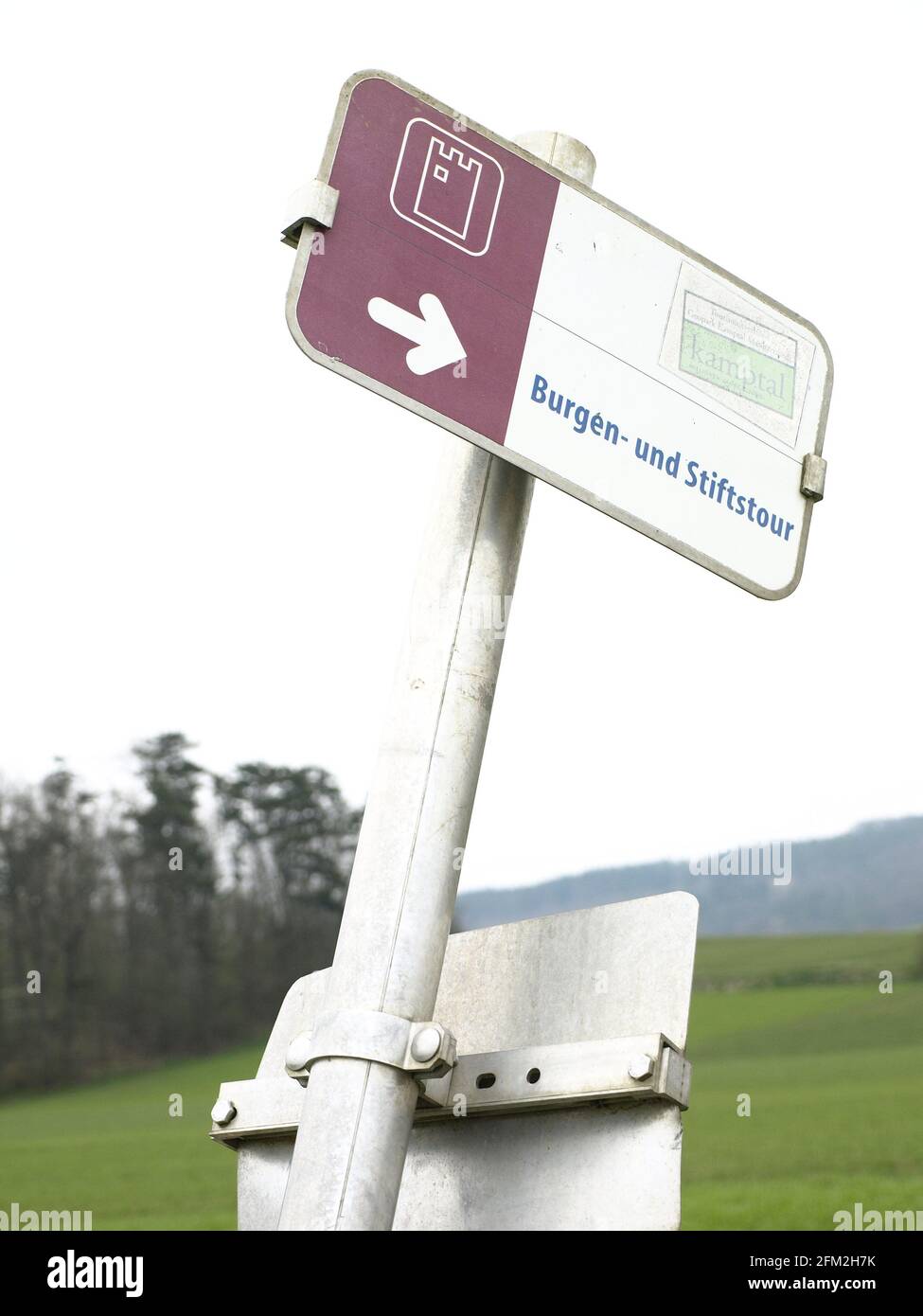 Sign showing the direction to castles and monastery tour in german ...