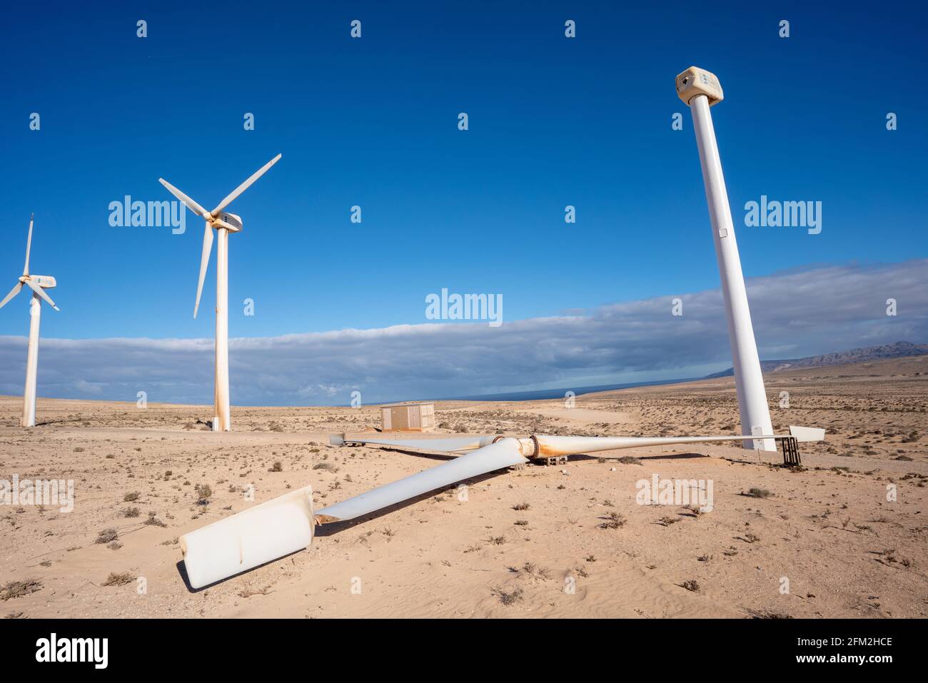 wind turbine in the desert with blue sky background. wind mill farm in ...