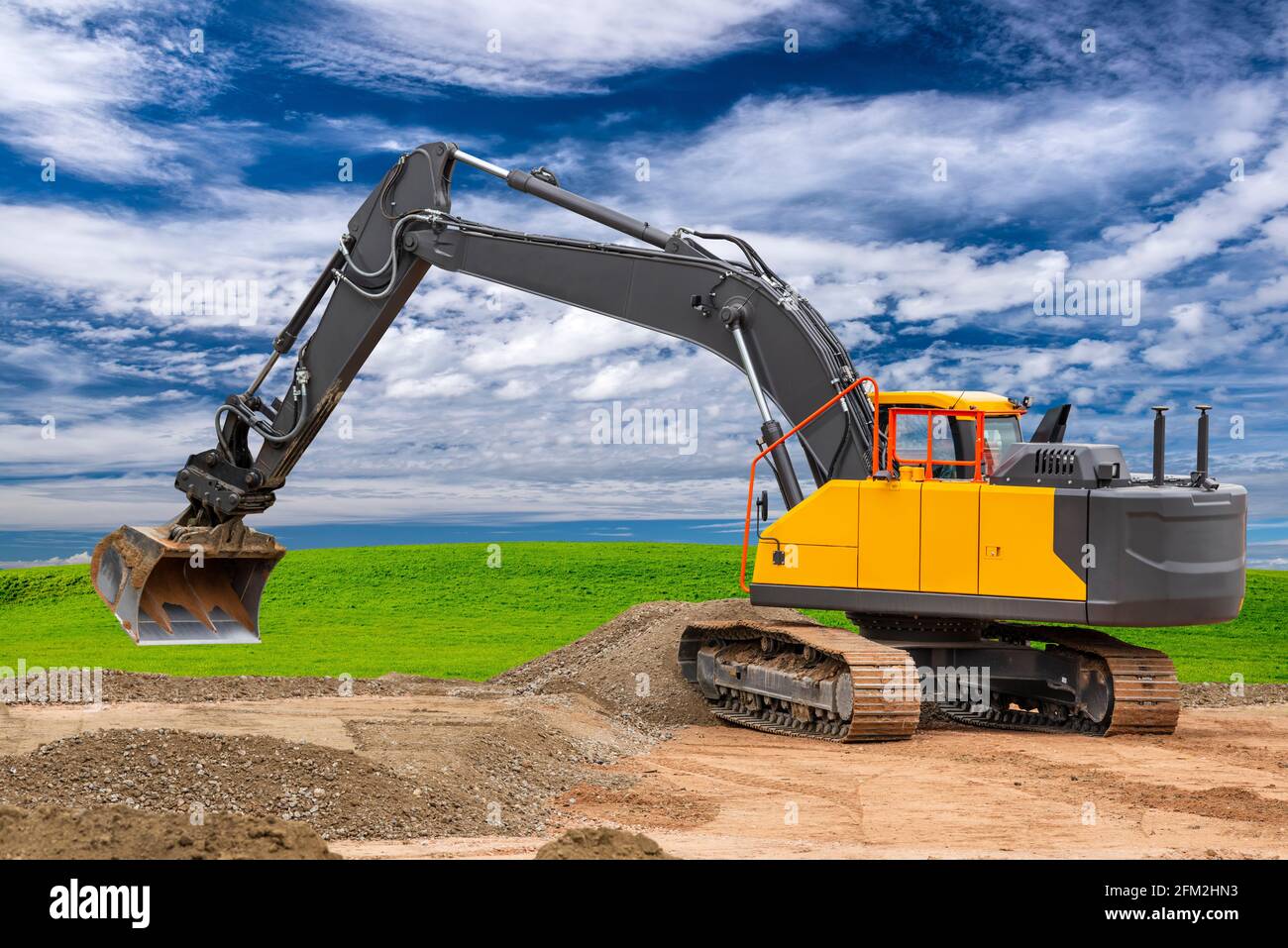 excavator at work on construction site Stock Photo - Alamy