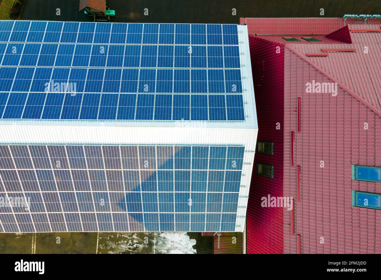 Aerial view of surface of blue photovoltaic solar panels mounted on ...