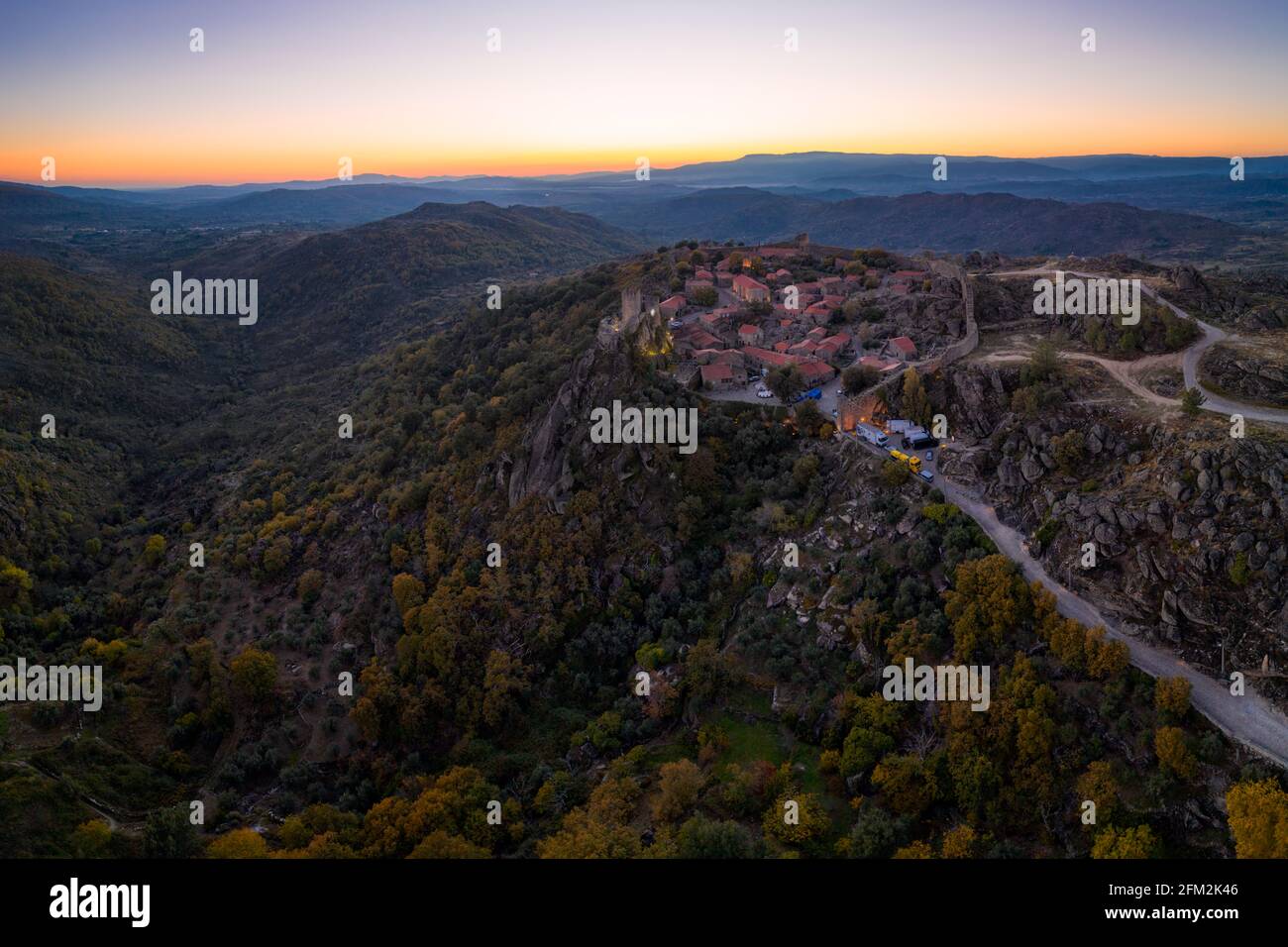 Drone aerial panorama of Sortelha historic village at sunset with ...