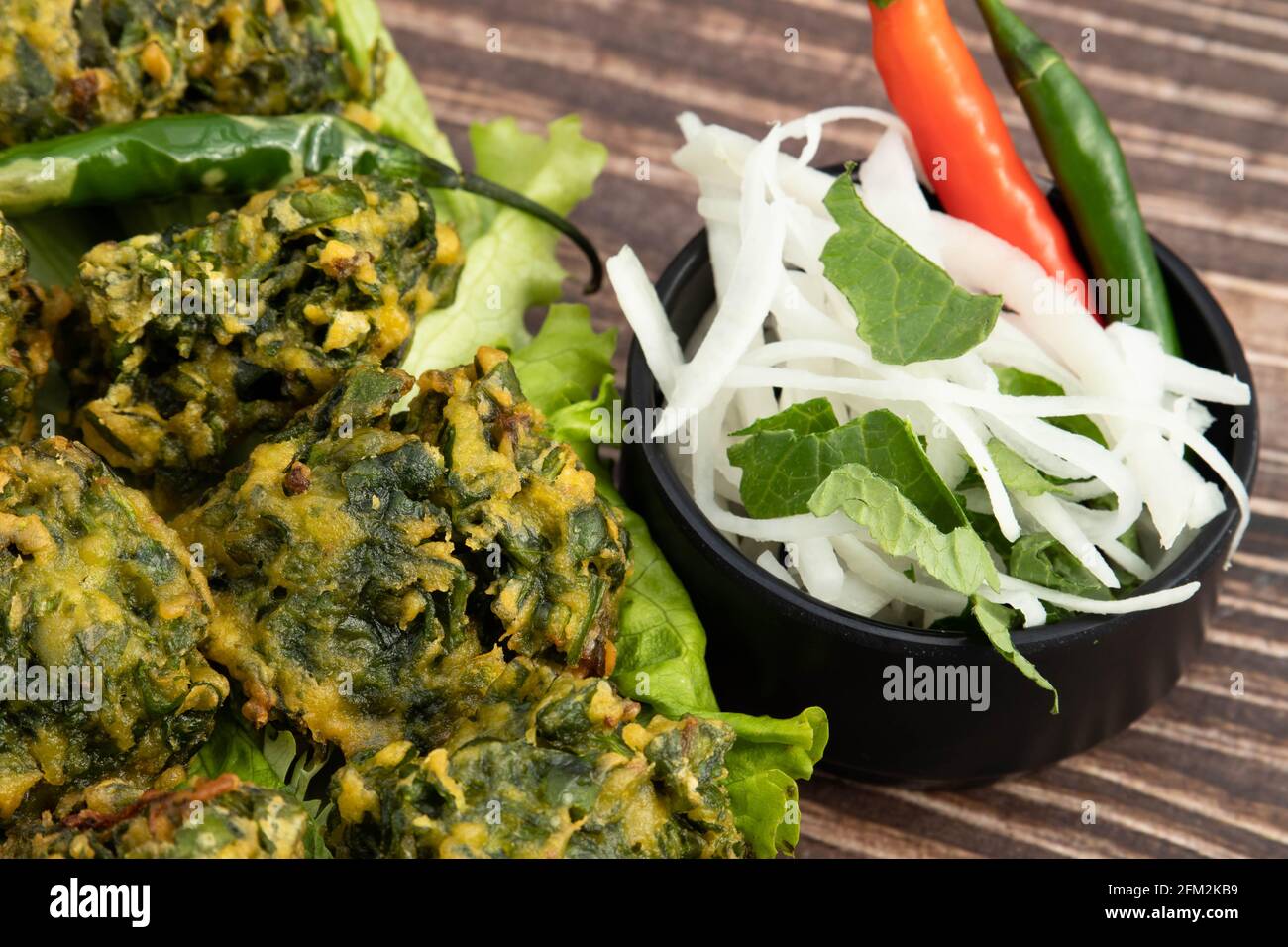 Spiced Indian Chaat Snacks Palak Pakoda Bhajji Chat Or Paalak Pakora ...