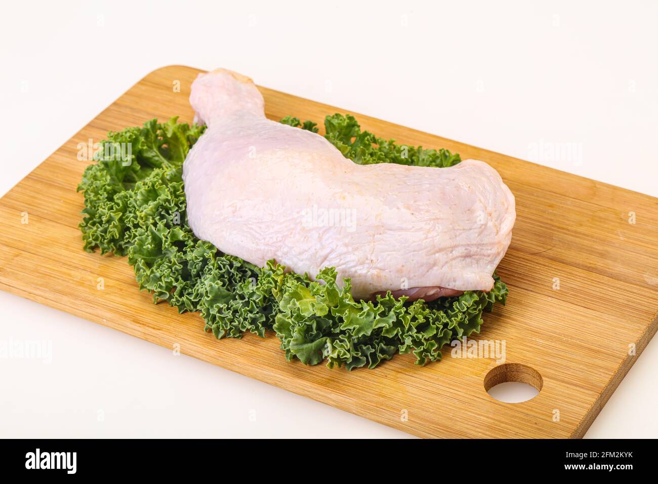 Raw uncooked chicken leg for cooking Stock Photo - Alamy