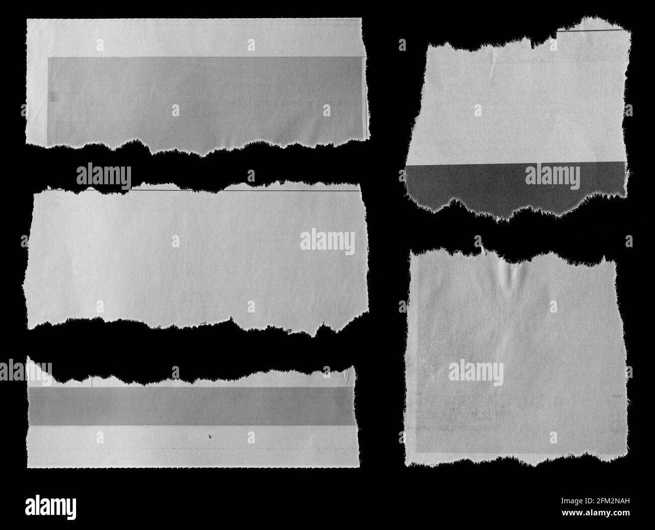 Five pieces of torn newspaper on black background Stock Photo - Alamy
