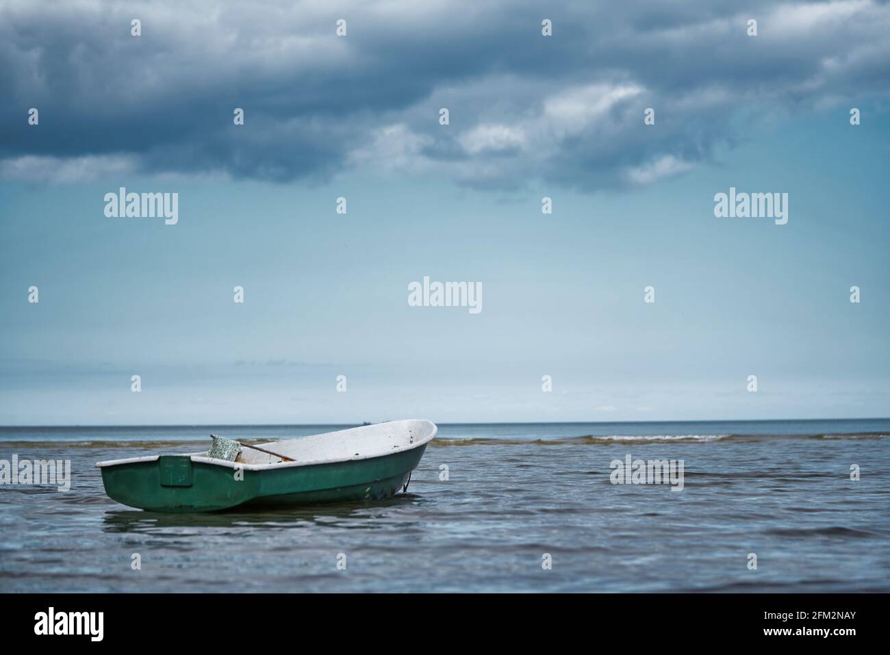 Small fishing boat with fishing net and equipment Stock Photo - Alamy