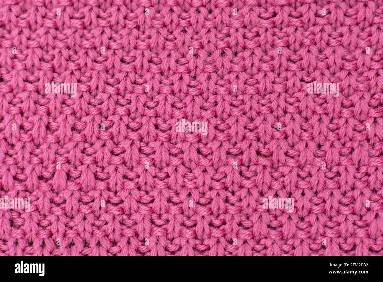 Knitted wool pink texture hi-res stock photography and images - Alamy