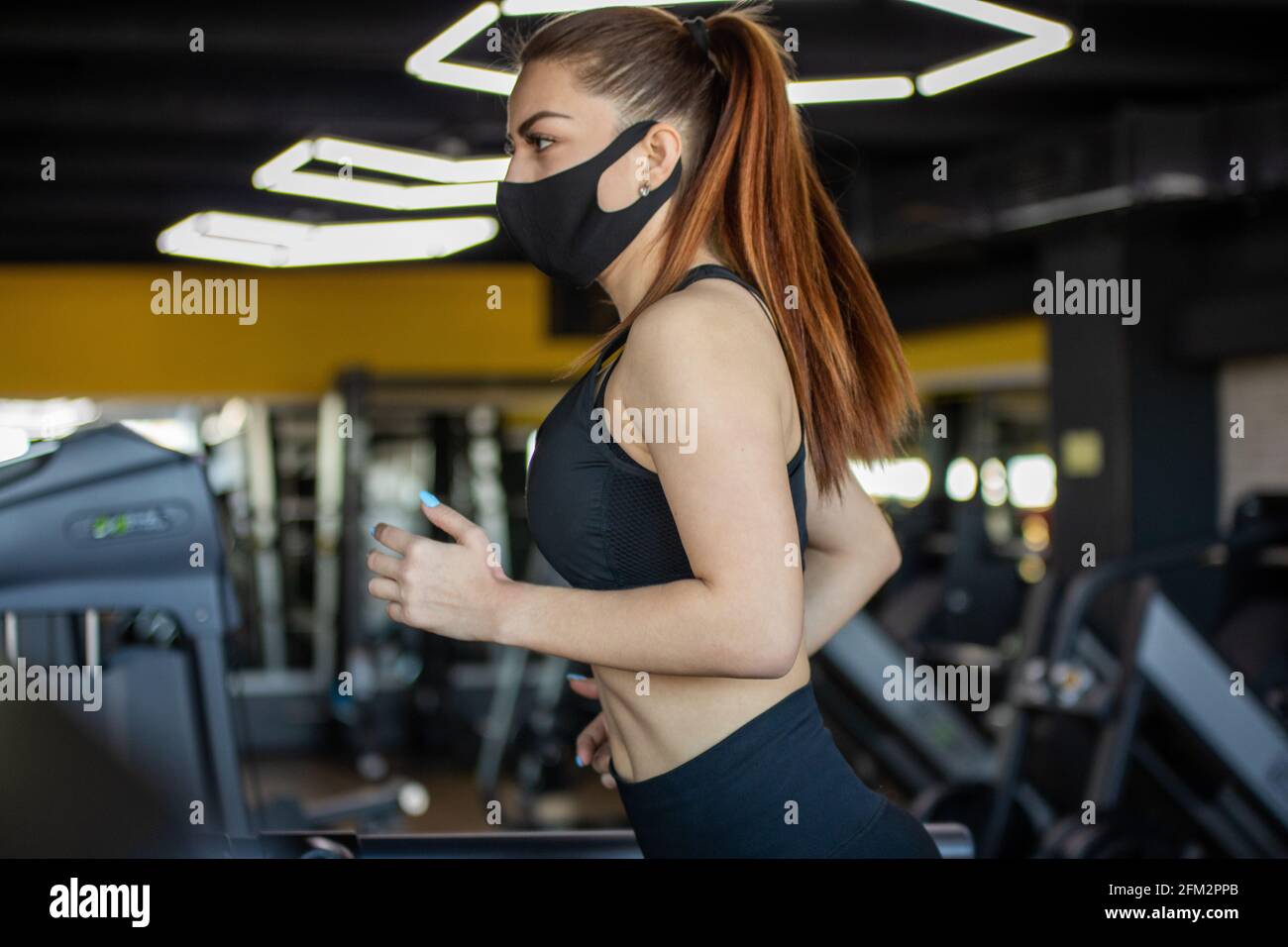 Young man treadmill mask hi-res stock photography and images - Alamy