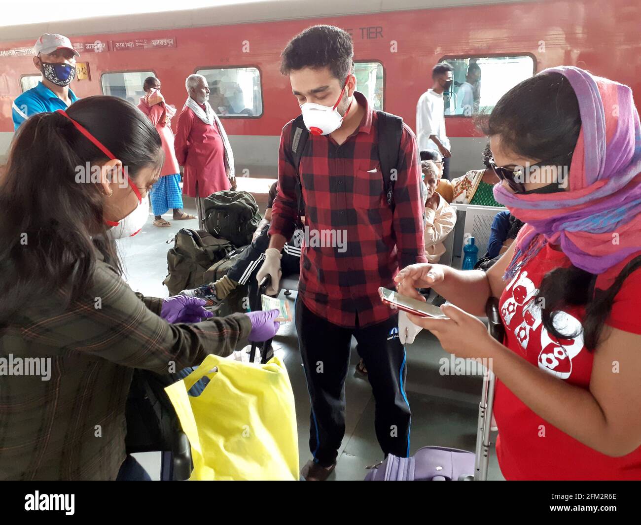 Passengers doing their last minute check before boarding the train at ...
