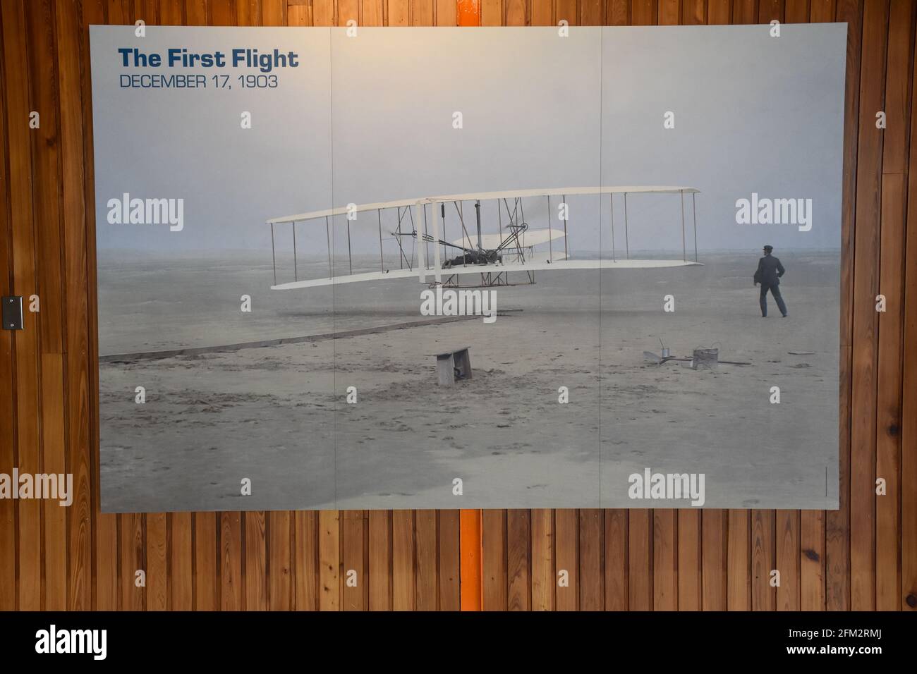 A Photograph of the Wright Brothers first flight on display at the ...