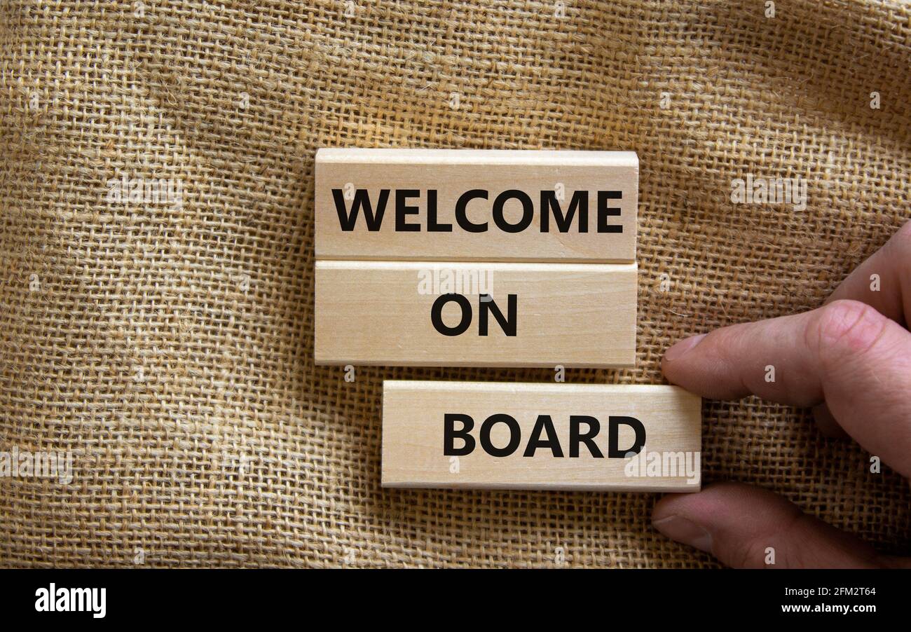Welcome on board symbol. Wooden blocks with words 'Welcome on board ...