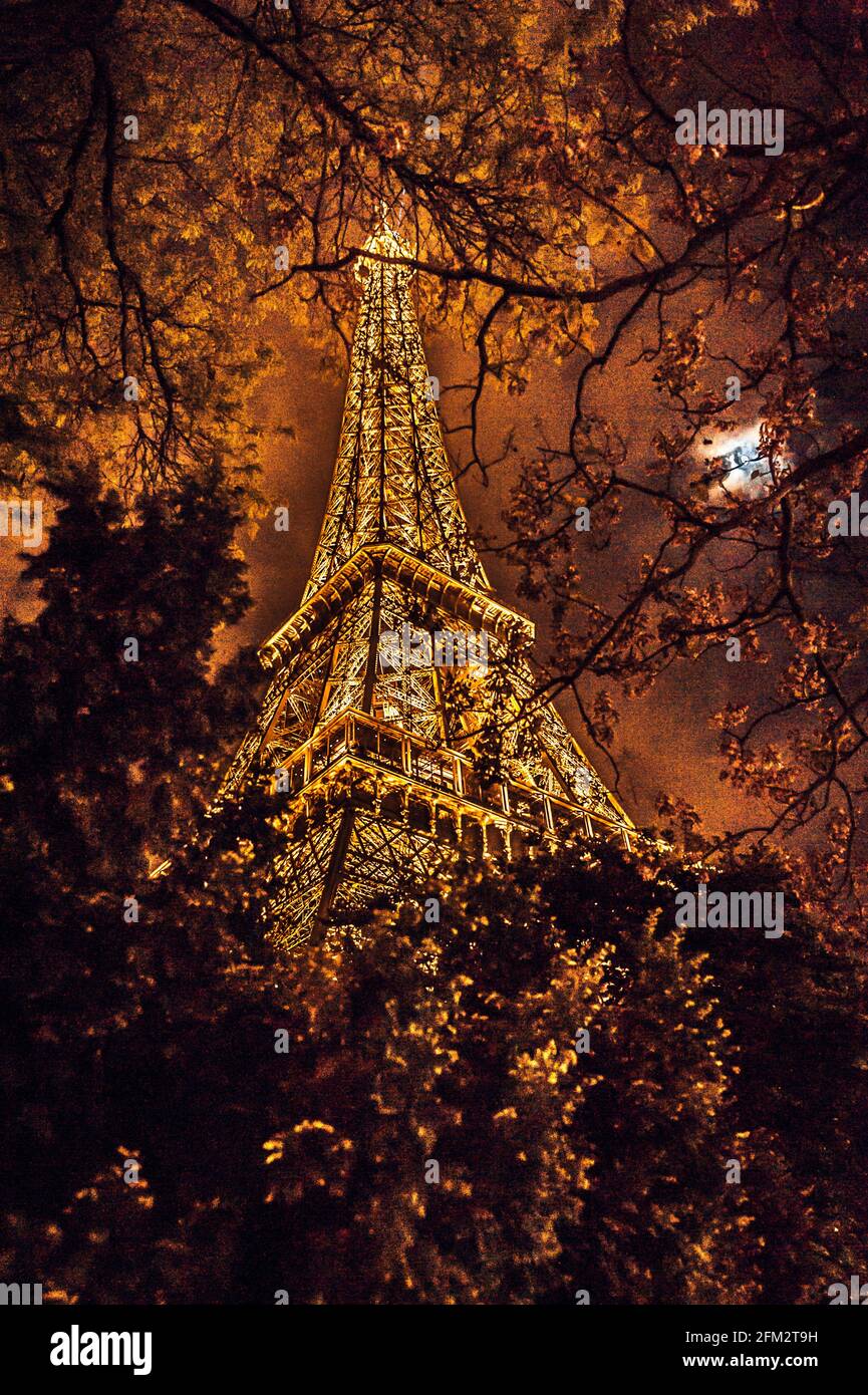 Eiffel tower illuminated at night Stock Photo - Alamy