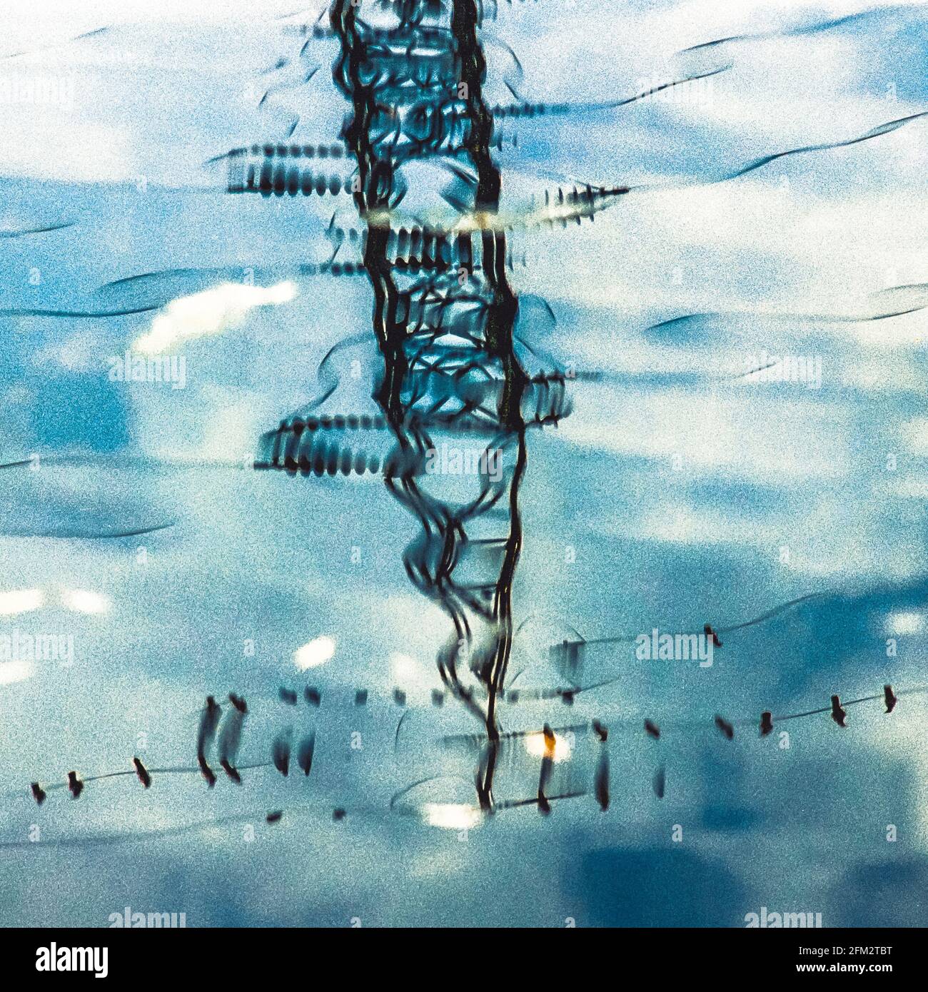 High voltage power line reflection in a pool Stock Photo - Alamy
