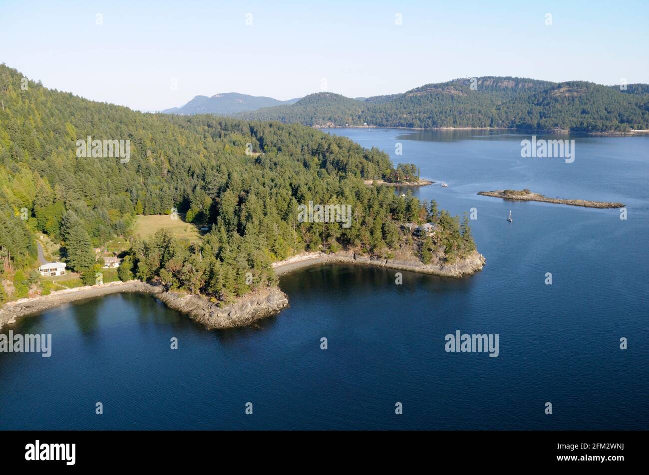 Welcome Bay and Navy Channel, North Pender Island, BC. Aerial ...