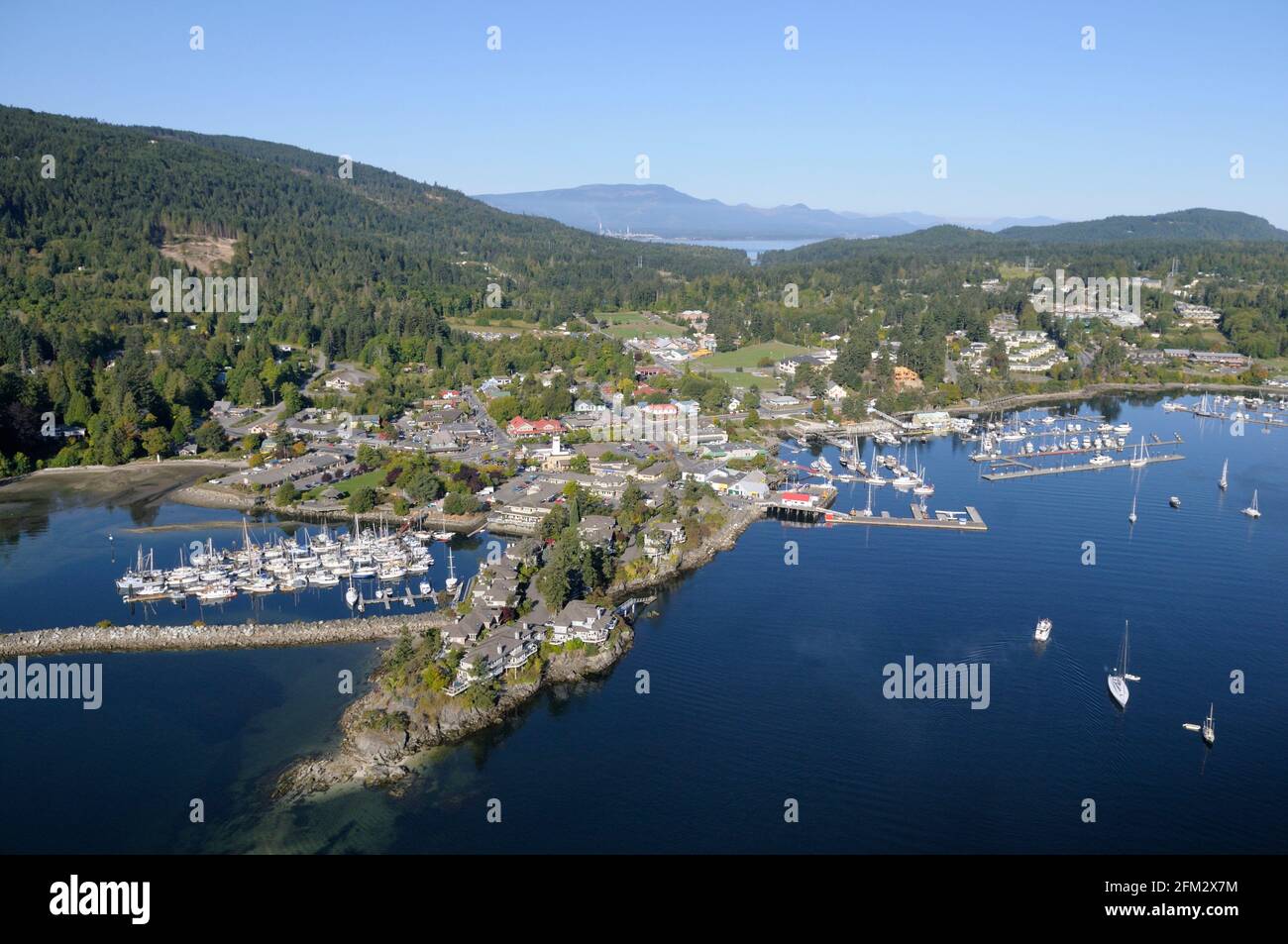 Aerial overview of the town of Ganges with Grace Point in the ...