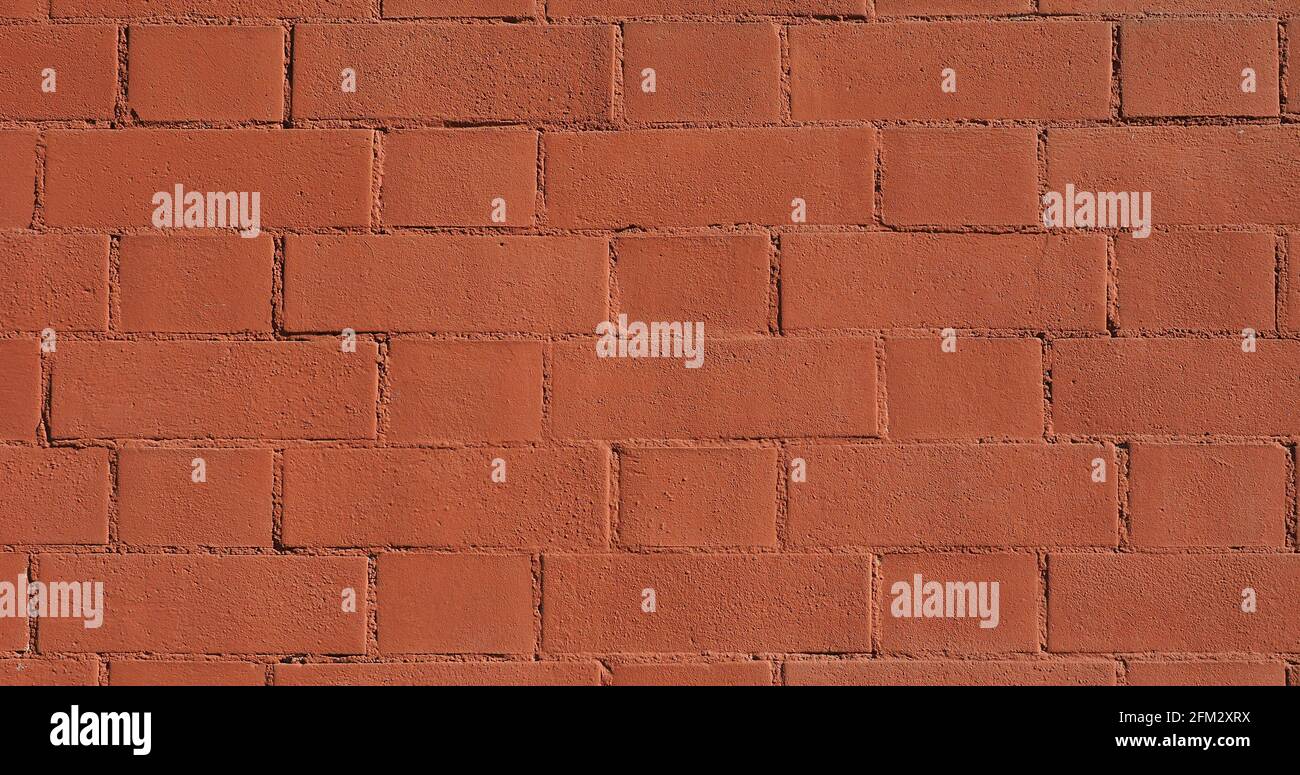 wide 4K red brick wall useful as a background Stock Photo - Alamy