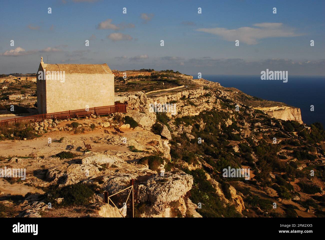 Small church in Dingli cliffs in Malta island with the stoned coast ...