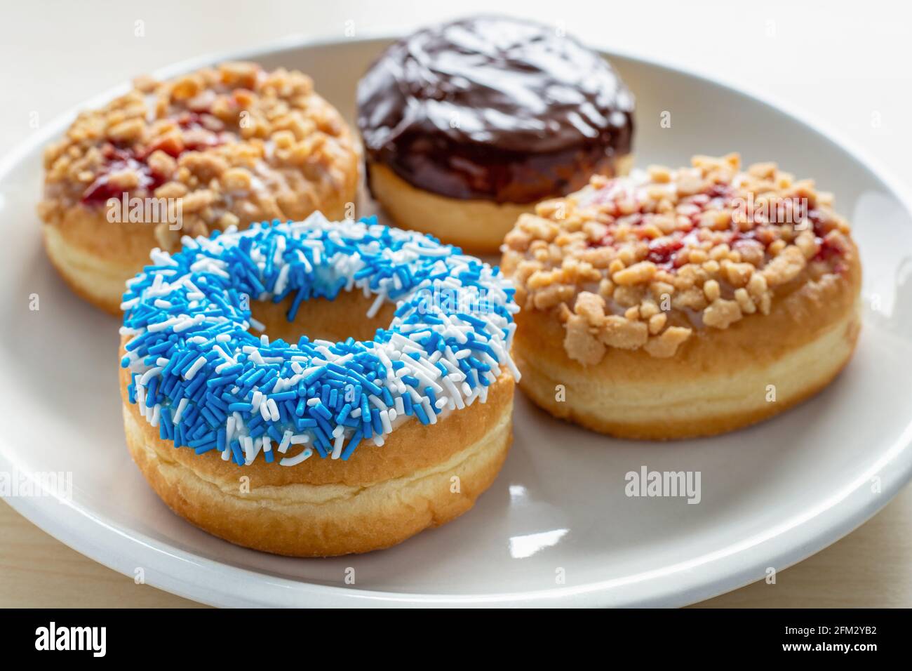 Donut with toppings hi-res stock photography and images - Alamy