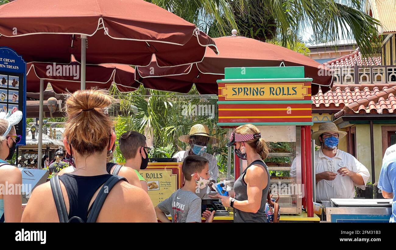 Orlando, FL USA - May 2, 2021: People waiting in line to buy ...